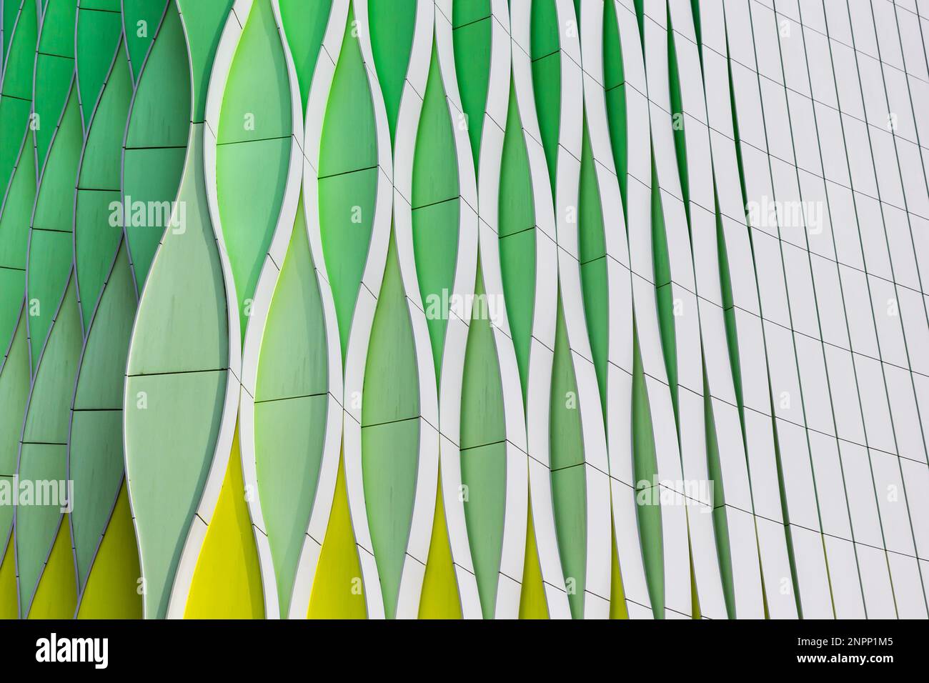 Green and yellow colors of the UMCG hospital building in Groningen ...