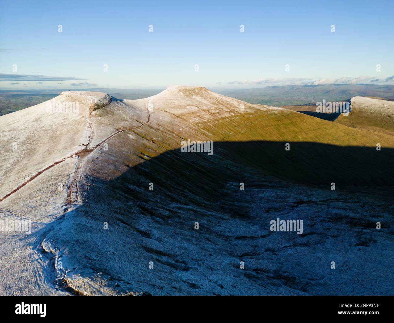 Aerial view of Pen-y-Fan in the Brecon Beacons with a light dusting of ...