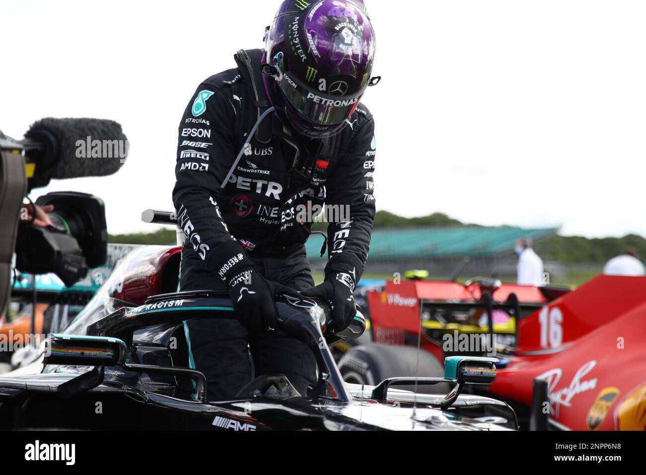 Mercedes driver Lewis Hamilton of Britain gets out of his car after ...