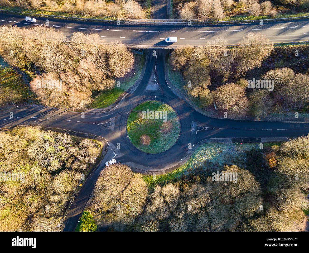 Aerial view of a small traffic roundabout in winter Stock Photo - Alamy