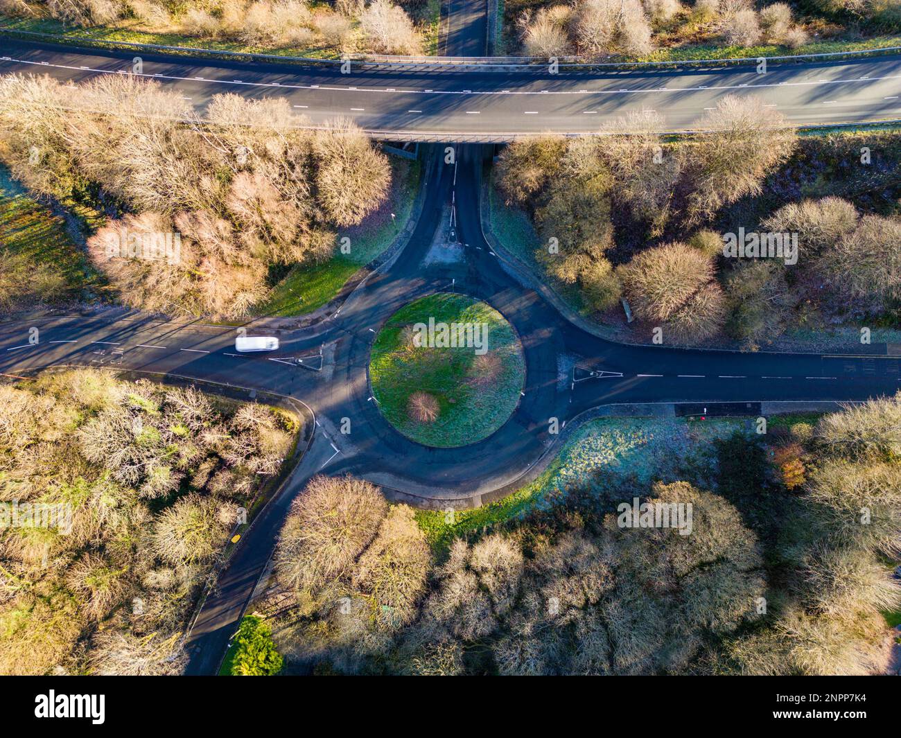 Aerial view of a roundabout (traffic circle) in winter Stock Photo - Alamy
