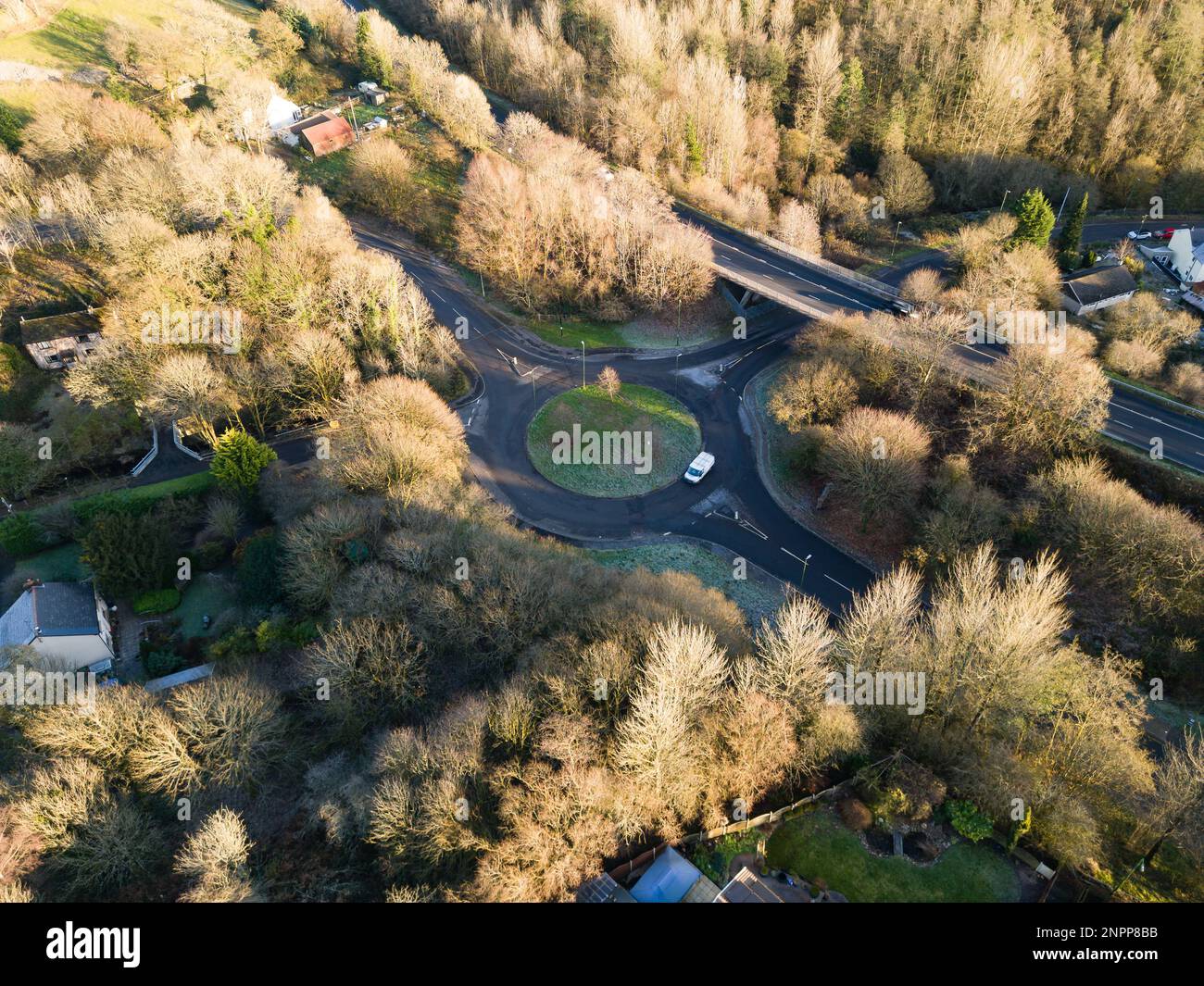 Aerial view of a small traffic roundabout in winter Stock Photo - Alamy