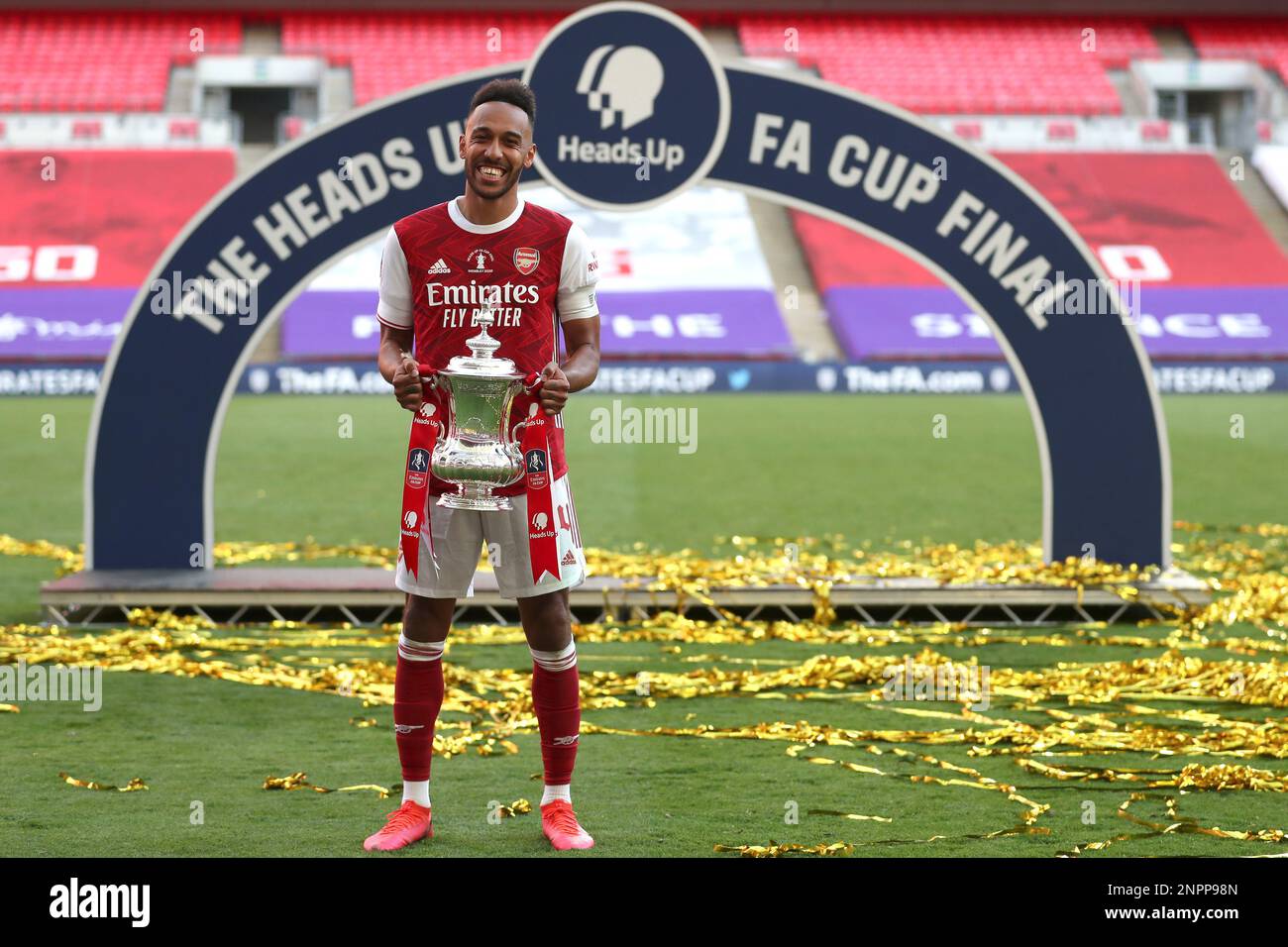 Arsenal's Pierre-Emerick Aubameyang poses with the trophy after the FA ...