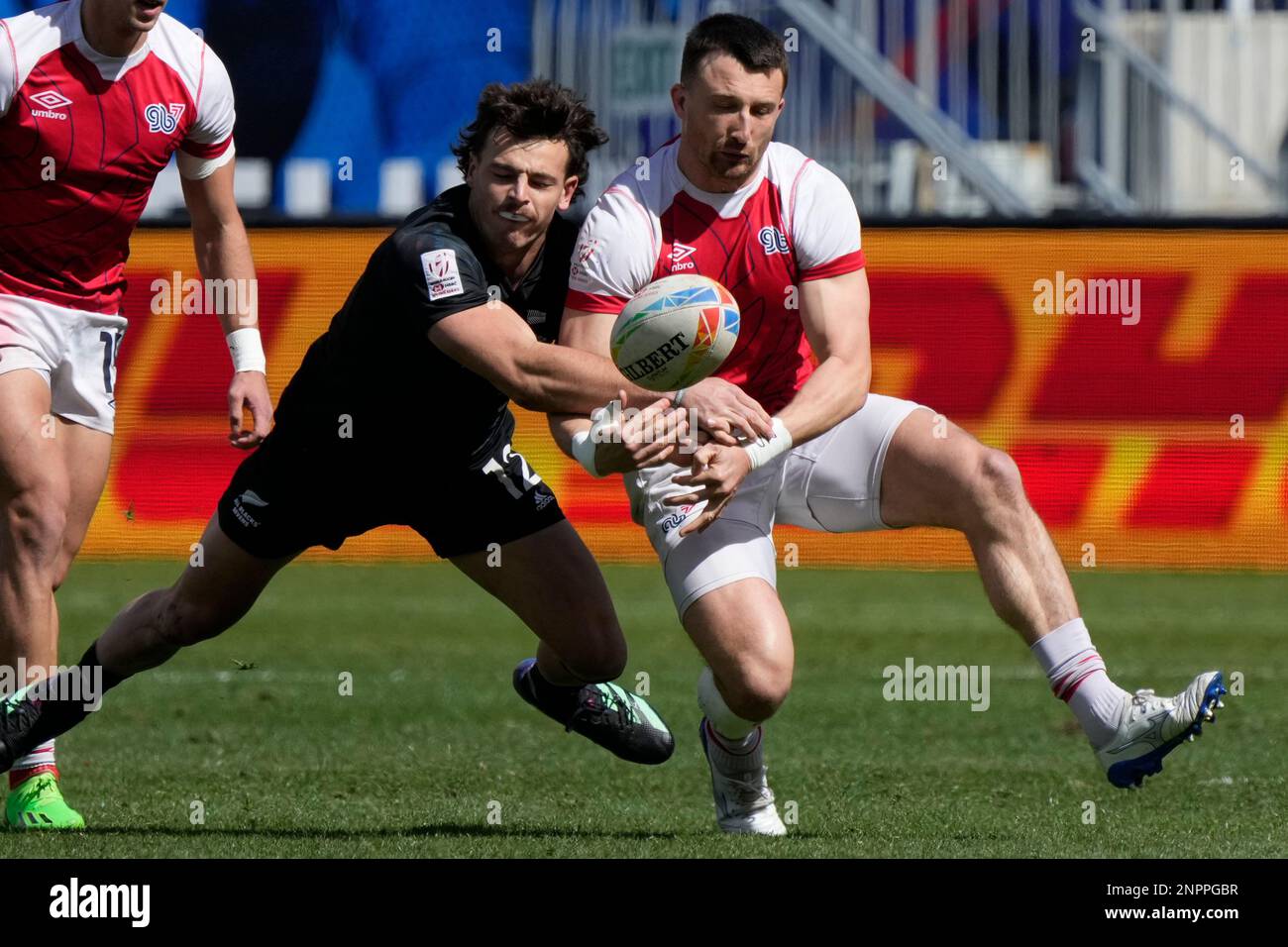 New Zealand's Leroy Carter, left, battles Great Britain's Alex Davis ...