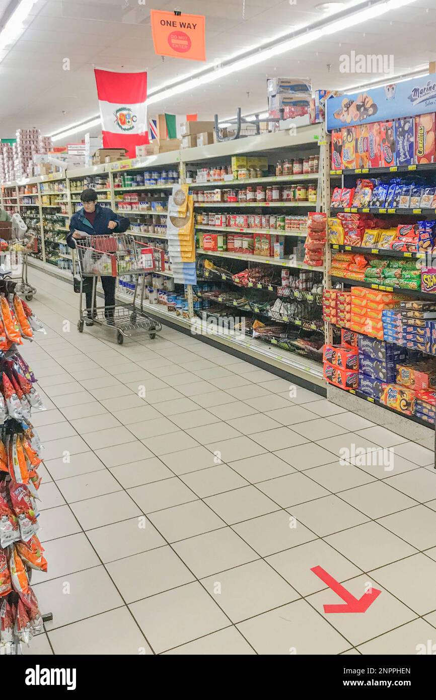 MADISON, WI - APRIL 23: Shoppers follow one-way arrows and directions ...