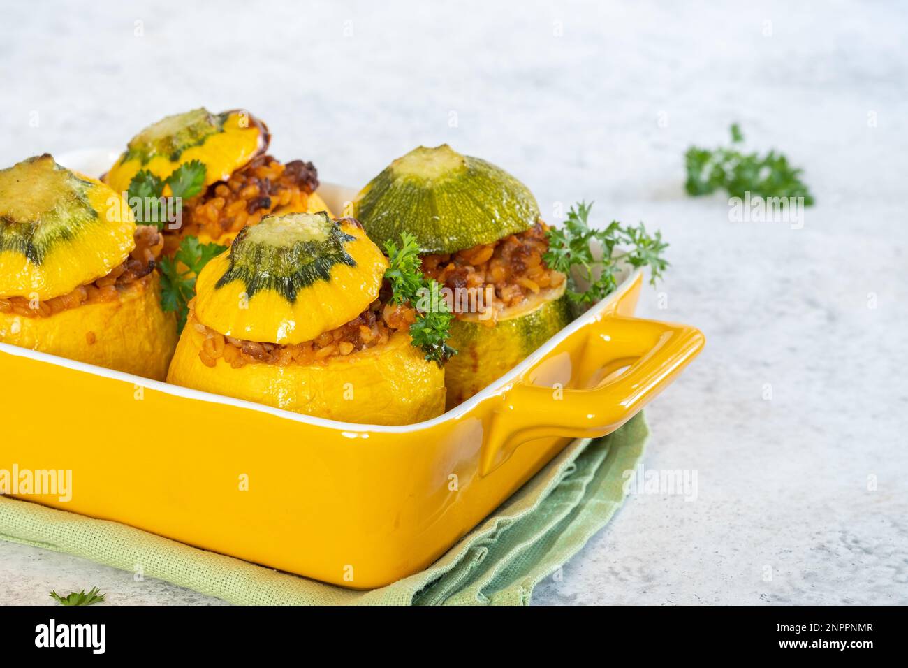 Eight-Ball zucchini stuffed with meat and bulgur Stock Photo - Alamy