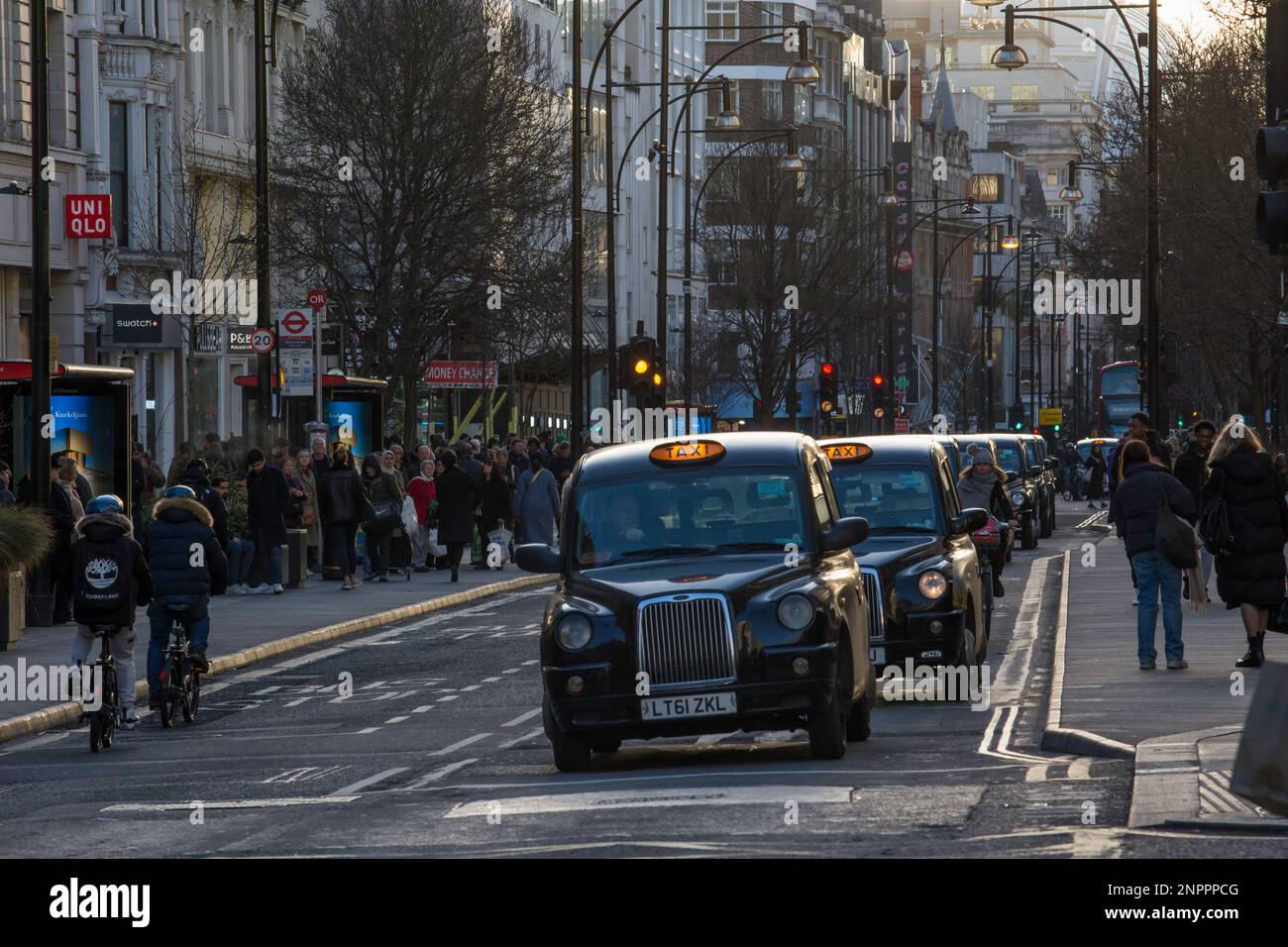 Big line of Taxis and shoppers on Oxford Street London near Oxford ...