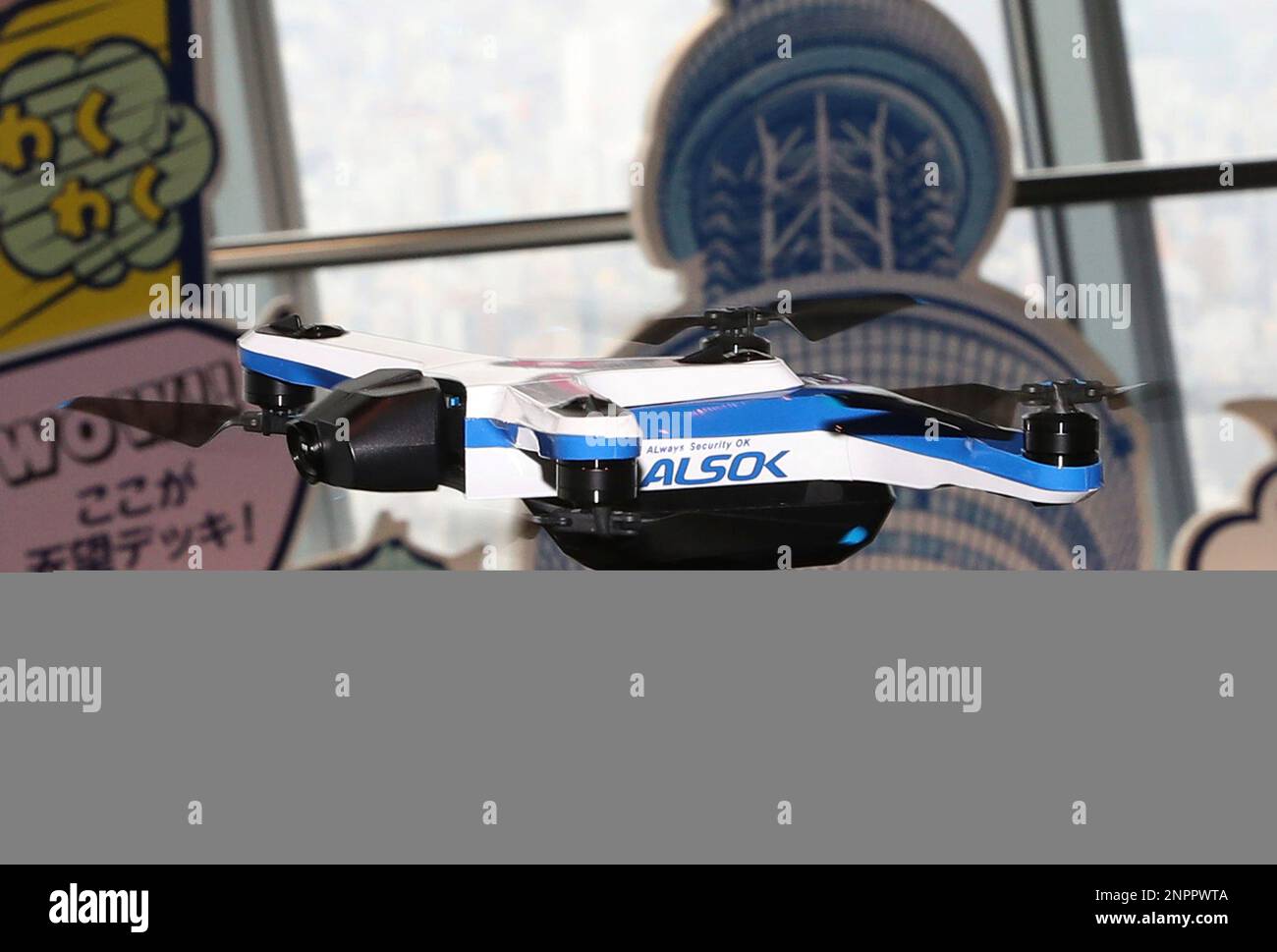 A drone patrols the observatory of Tokyo Skytree durig a demonstration ...