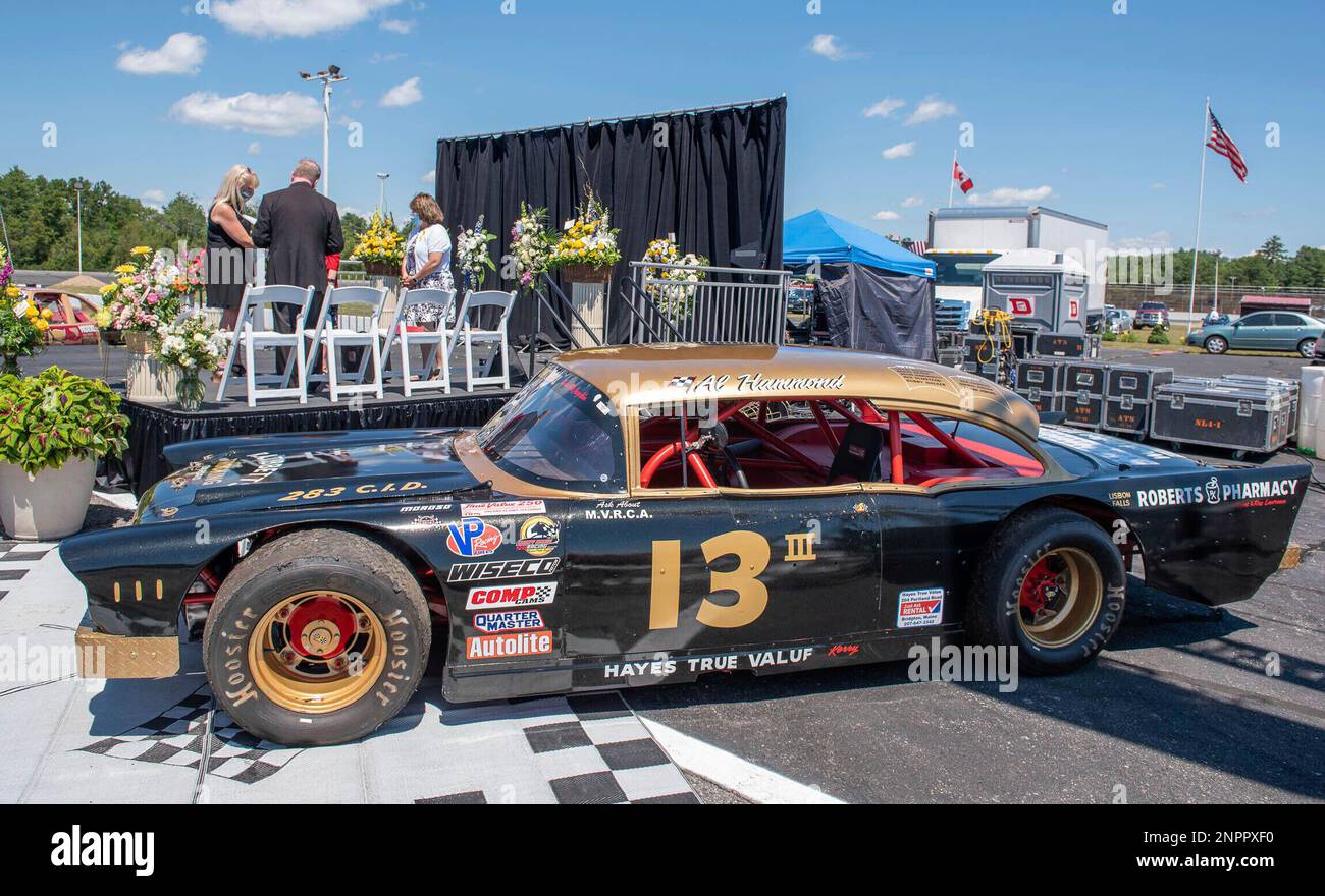 A car from Bob Bahre's collection flanked the stage of his funeral at ...