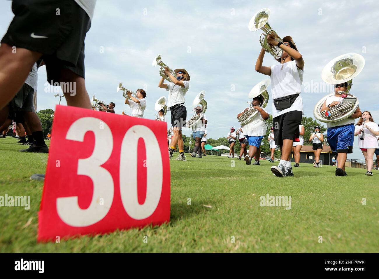 The Ripley High School Marching Band runs through their routine as they ...