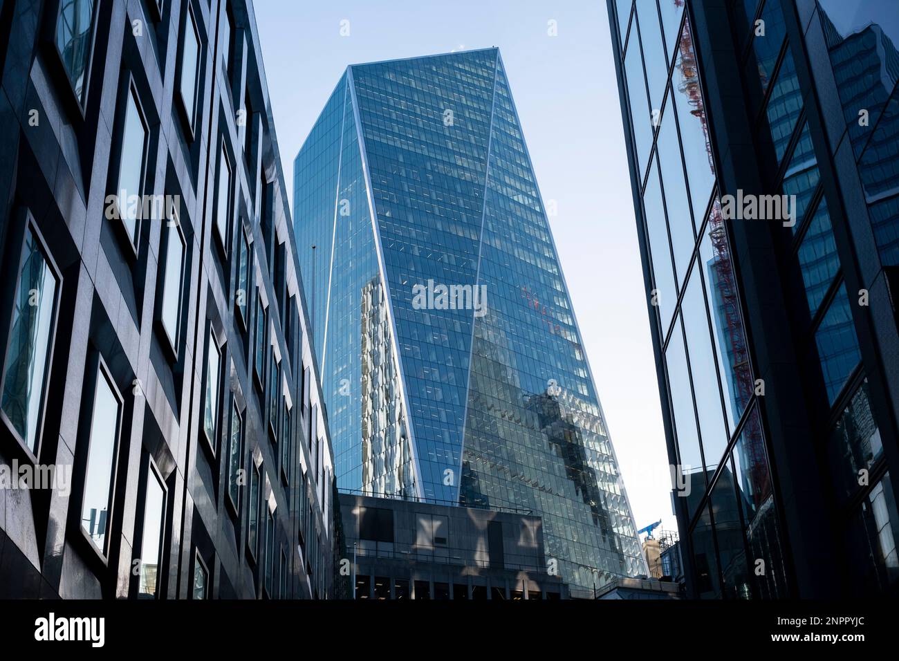 Workman with a set of ladders outside the Cabinet Office on Whitehall ...