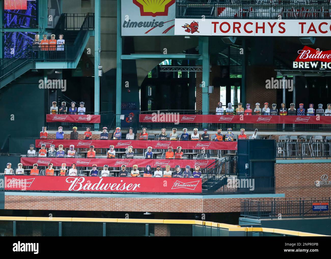 HOUSTON, TX - JULY 28: Fake fans occupy the bar area behind center ...