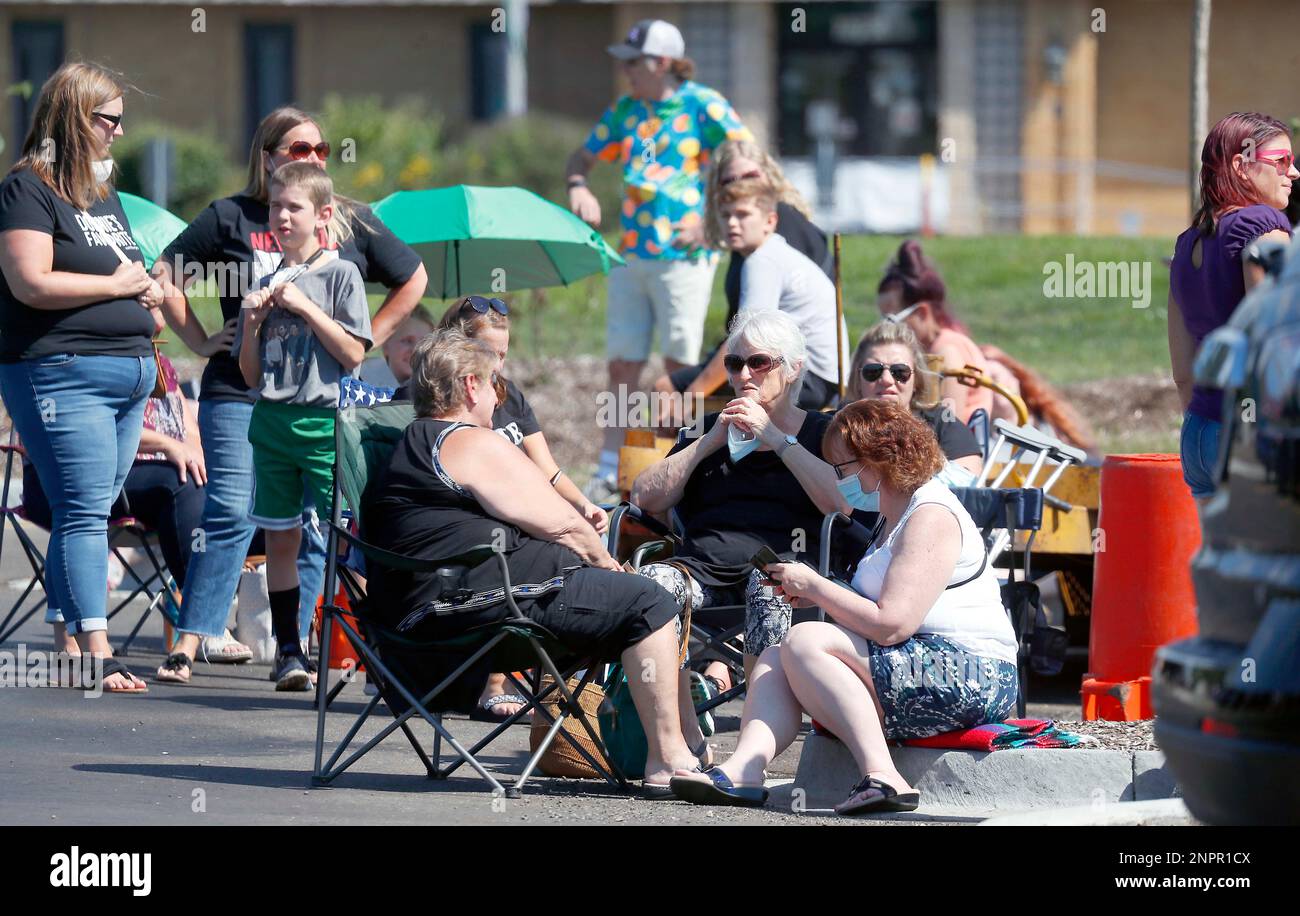 People started lining up shortly after dawn Tuesday to be the first ...