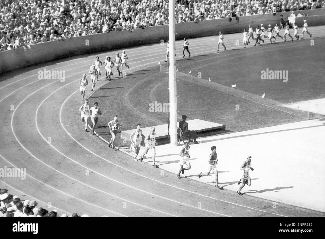 FILE - In this Aug,. 7, 1932, file photo, competitors circle the track ...