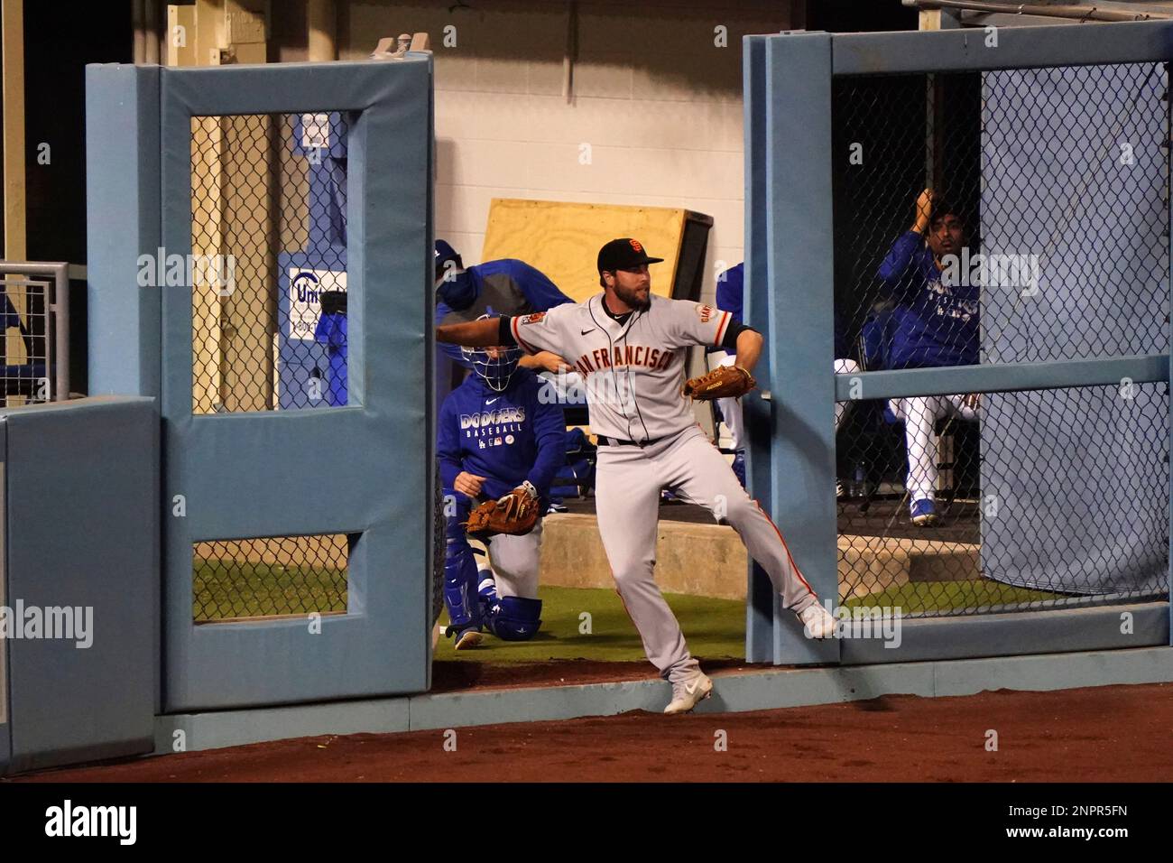 San Francisco Giants first baseman Darin Ruf (33) crashes into the Los ...