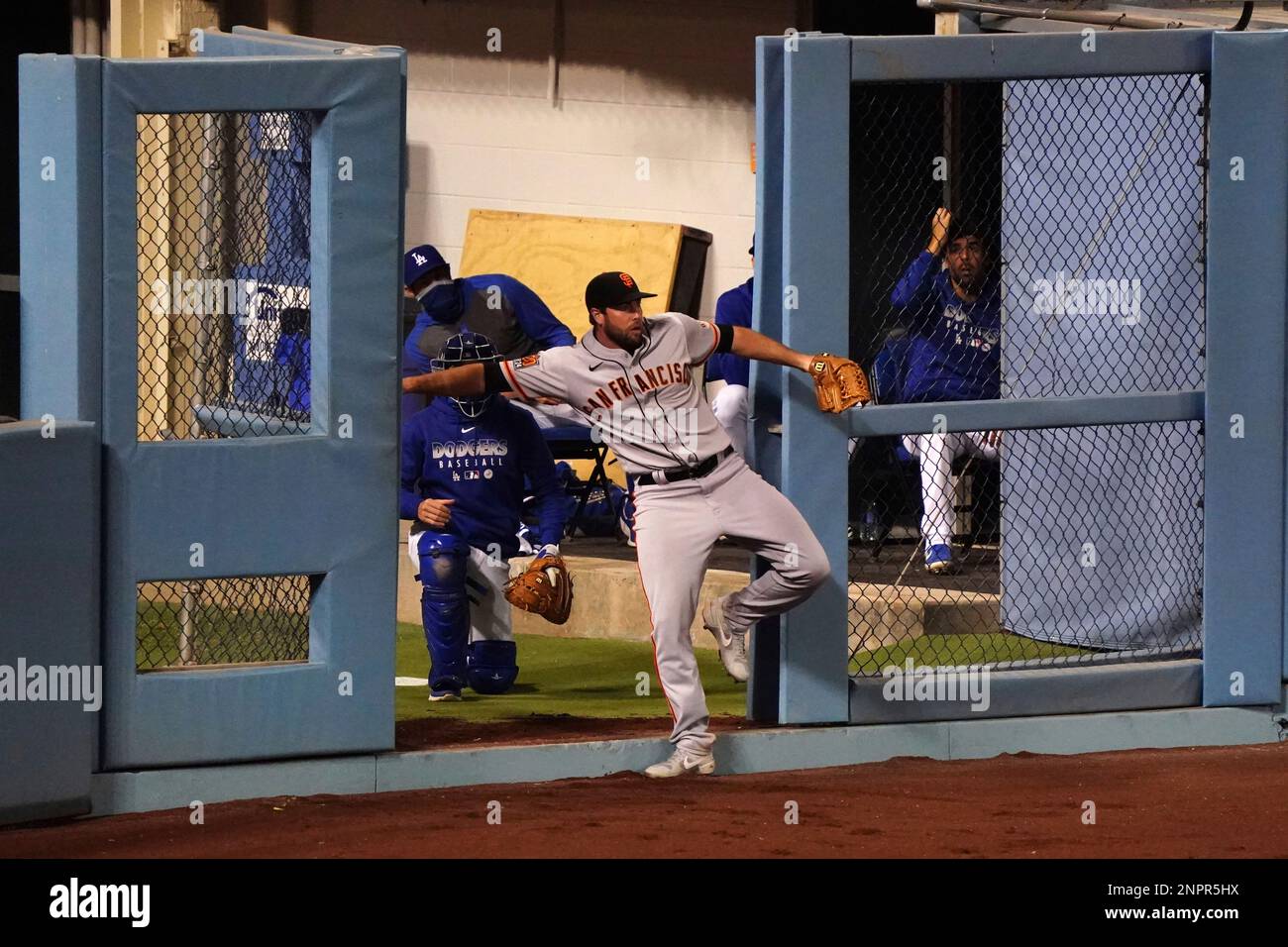 San Francisco Giants first baseman Darin Ruf (33) crashes into the Los ...