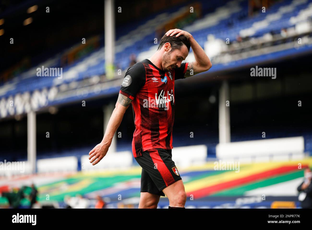 Bournemouth's Adam Smith walks off the field after their English ...