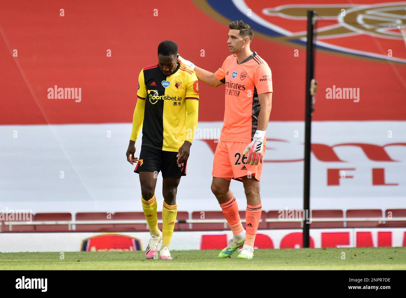 Watford's Danny Welbeck, left, and teammate Ben Foster walk off the ...
