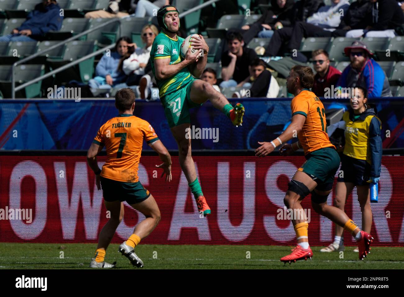 Ireland's Matthew McDonald, center, catches the ball as Australia's ...