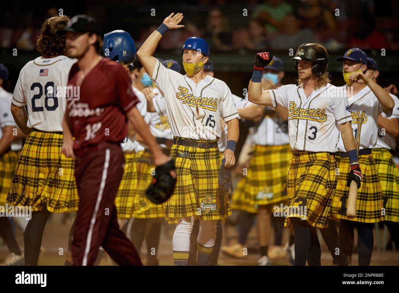 Savannah Bananas Nick Clarno (15), Kyler Marquis (3), and Josiah Siegel ...