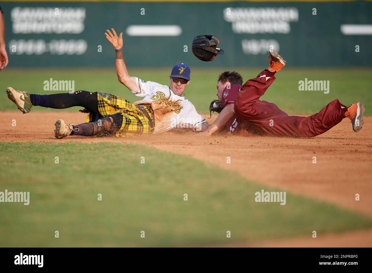 Savannah Bananas shortstop Gabe Howell (6) tags RJ Yeager (45) out on a ...