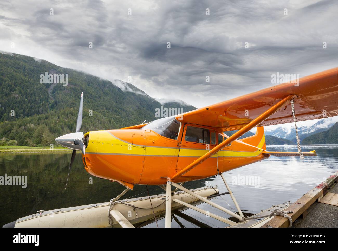 Float Plane in the mountains lake, Canada Stock Photo - Alamy