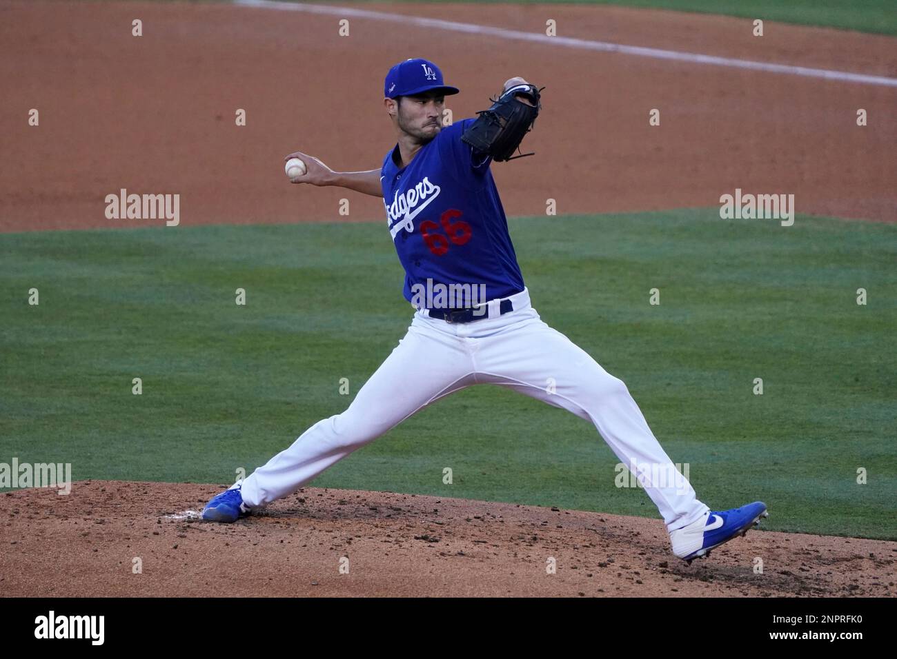 Los Angeles Dodgers pitcher Mitch White (66) delivers a pitch during a ...