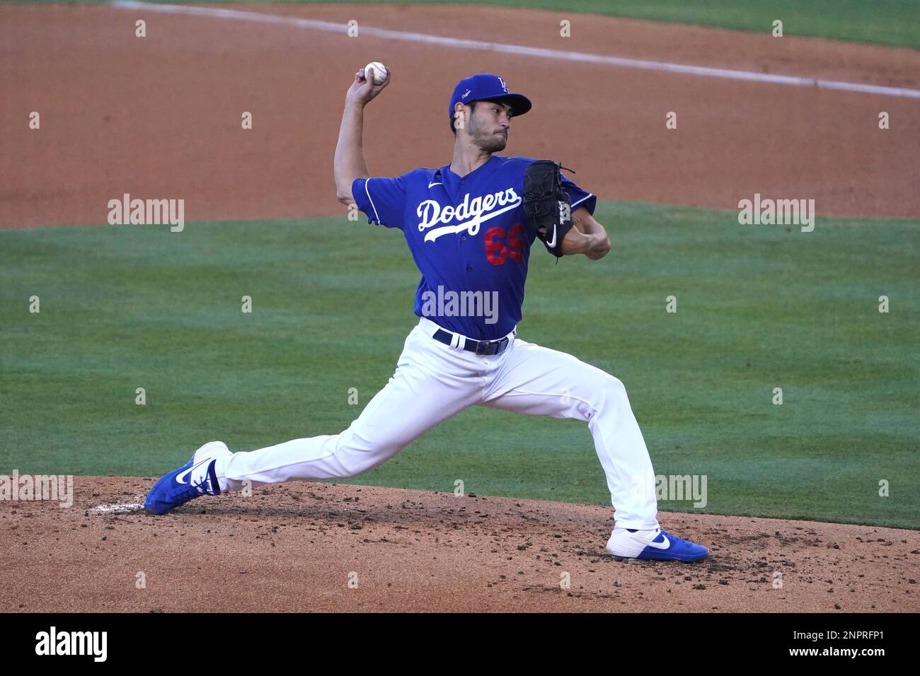Los Angeles Dodgers pitcher Mitch White (66) delivers a pitch during a ...
