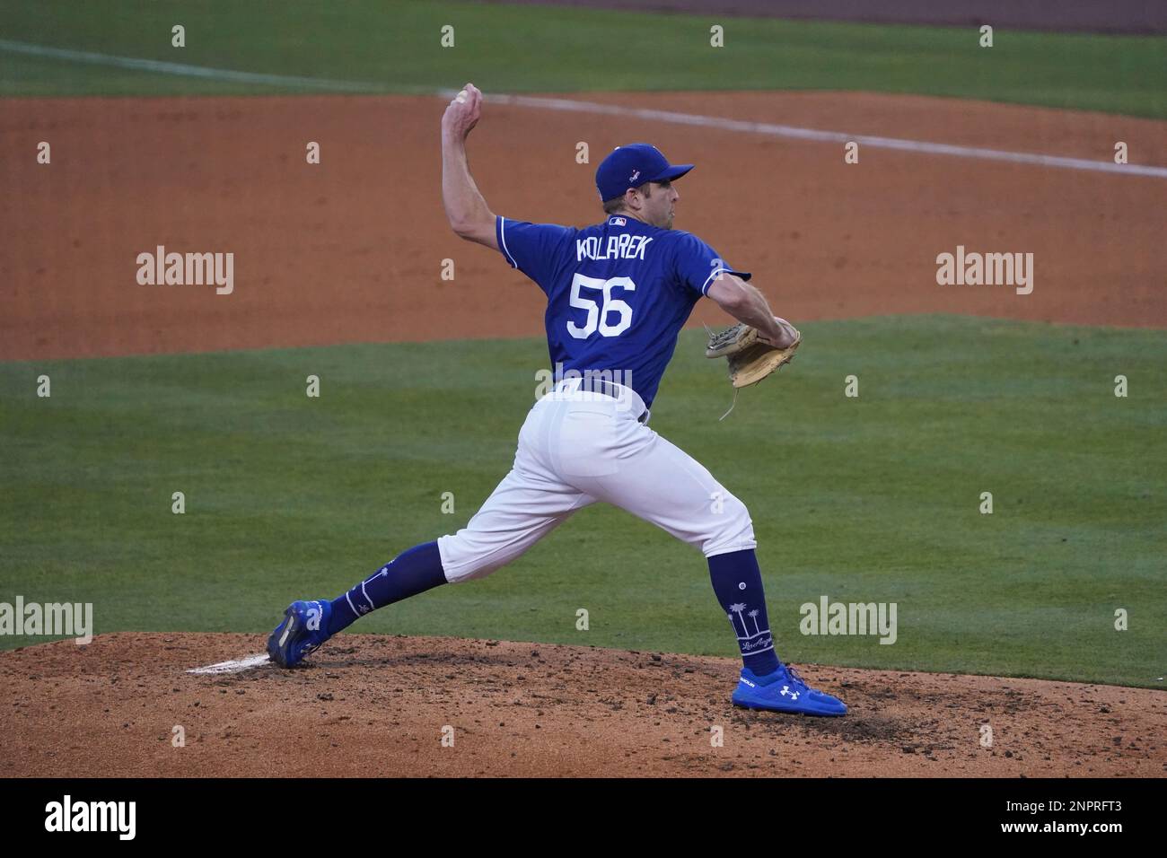 Los Angeles Dodgers relief pitcher Adam Kolarek (56) delivers a pitch ...