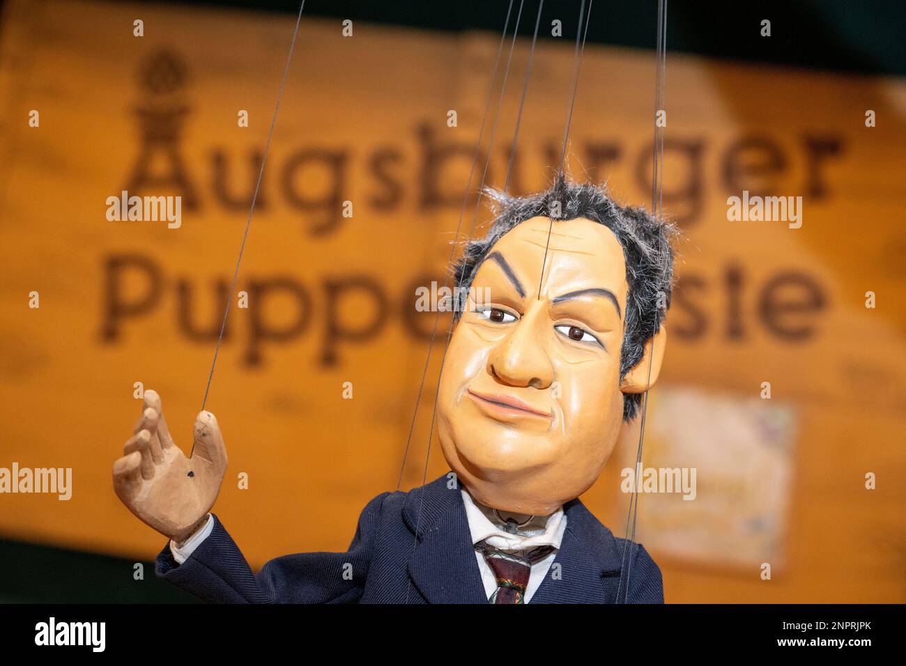 Augsburg, Germany. 26th Feb, 2023. A puppet representing Markus Söder ...