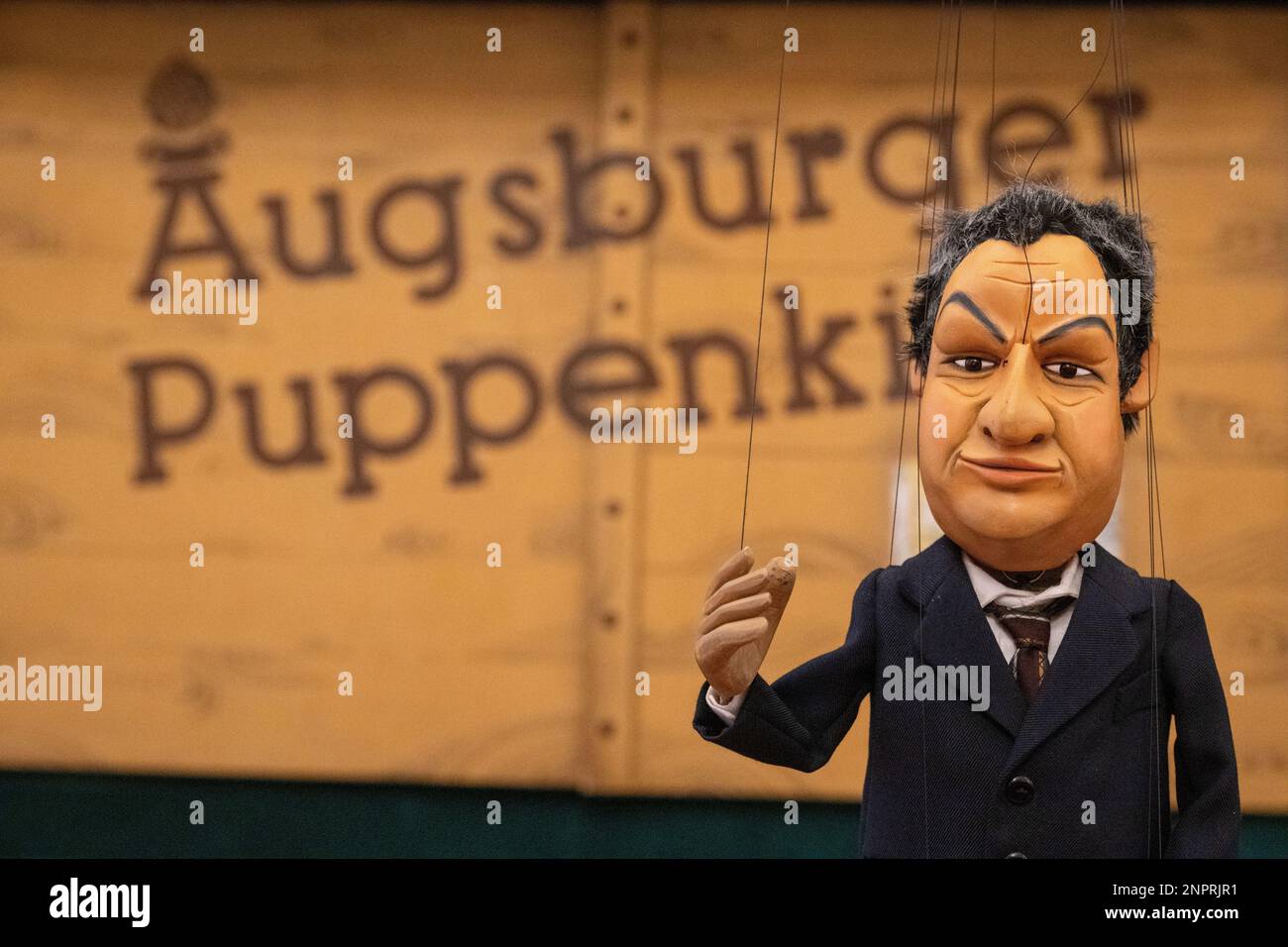 Augsburg, Germany. 26th Feb, 2023. A puppet representing Markus Söder ...