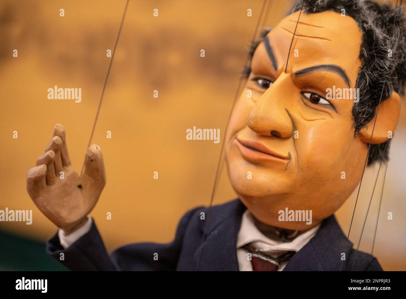 Augsburg, Germany. 26th Feb, 2023. A puppet representing Markus Söder ...