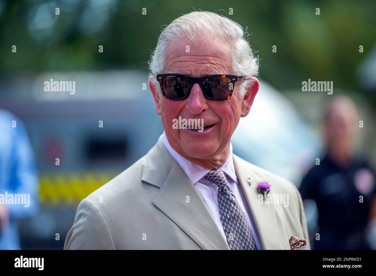Britain's Prince Charles speaks to emergency workers during a visit to ...