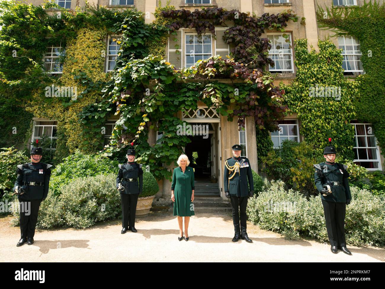 Britain's Camilla, the Duchess of Cornwall, centre, alongside Colonel ...