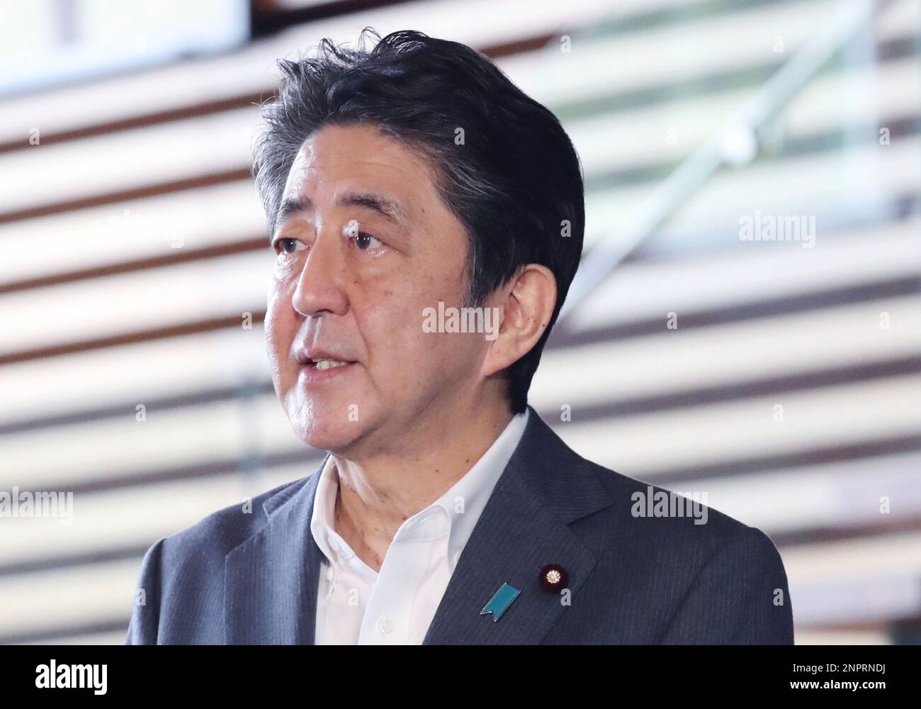 Japan's Prime Minister Shinzo Abe wearing a face mask (abenomask ...