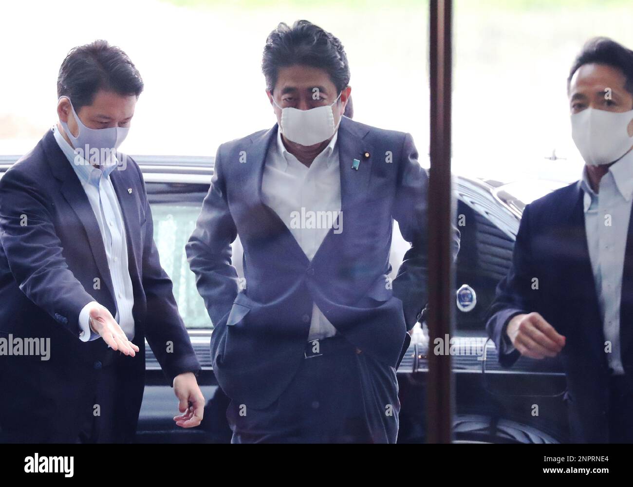 Japan's Prime Minister Shinzo Abe wearing a face mask (abenomask ...