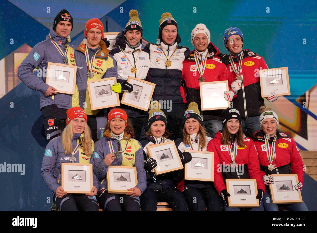 Team Germany, Norway and Austria celebrate on the podium during the ...