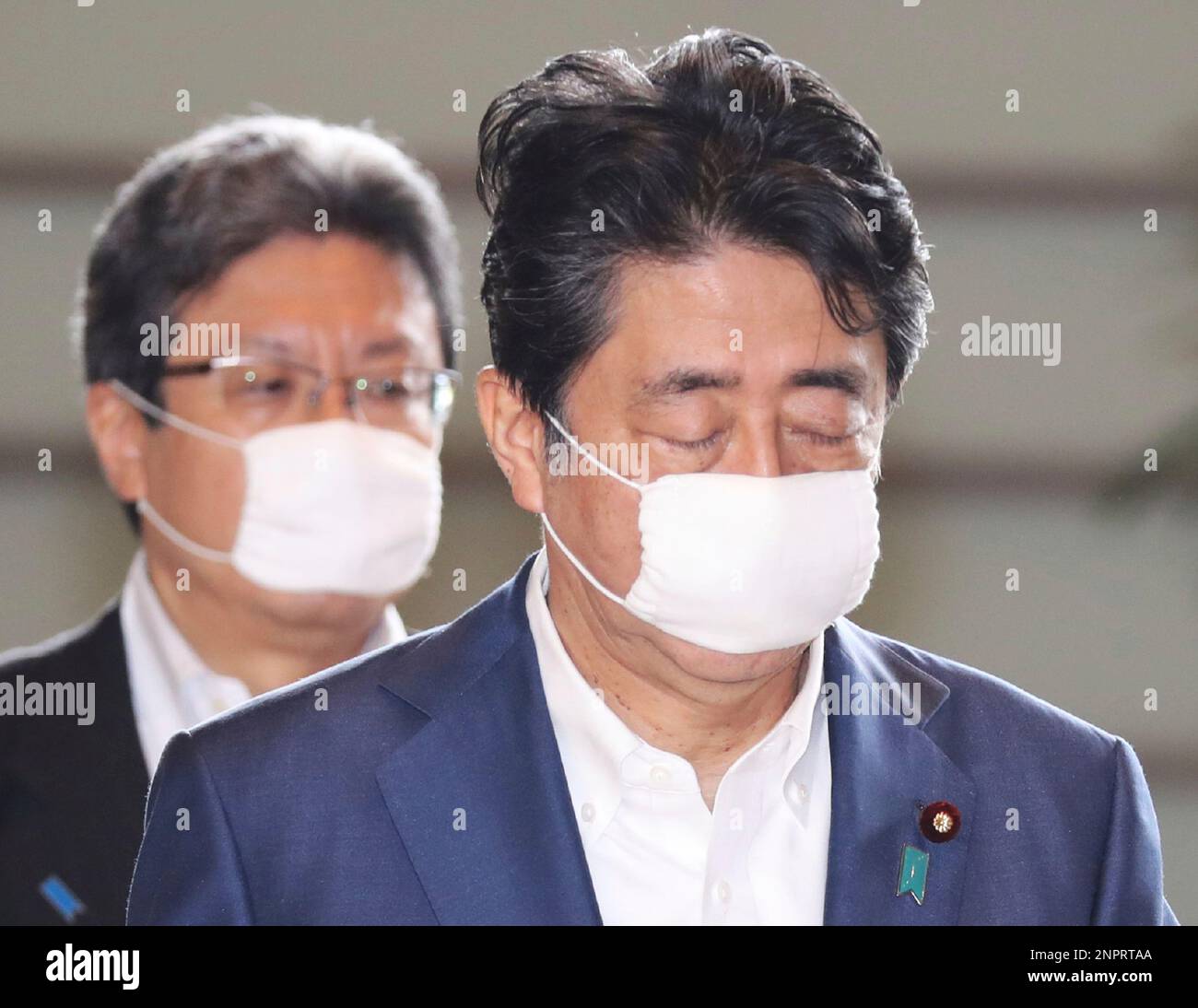 Japan's Prime Minister Shinzo Abe wearing a face mask (abenomask ...