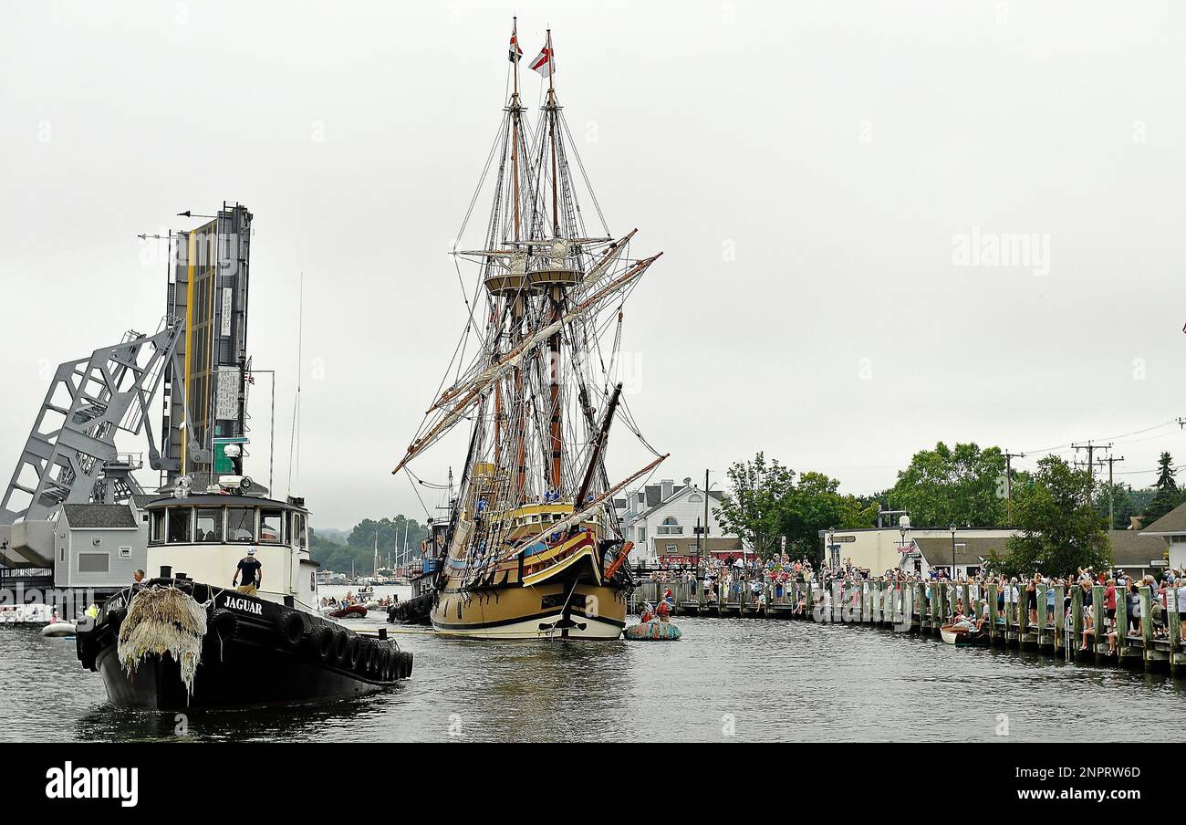 The tugboat Jaguar tows the Mayflower II through the Mystic River ...