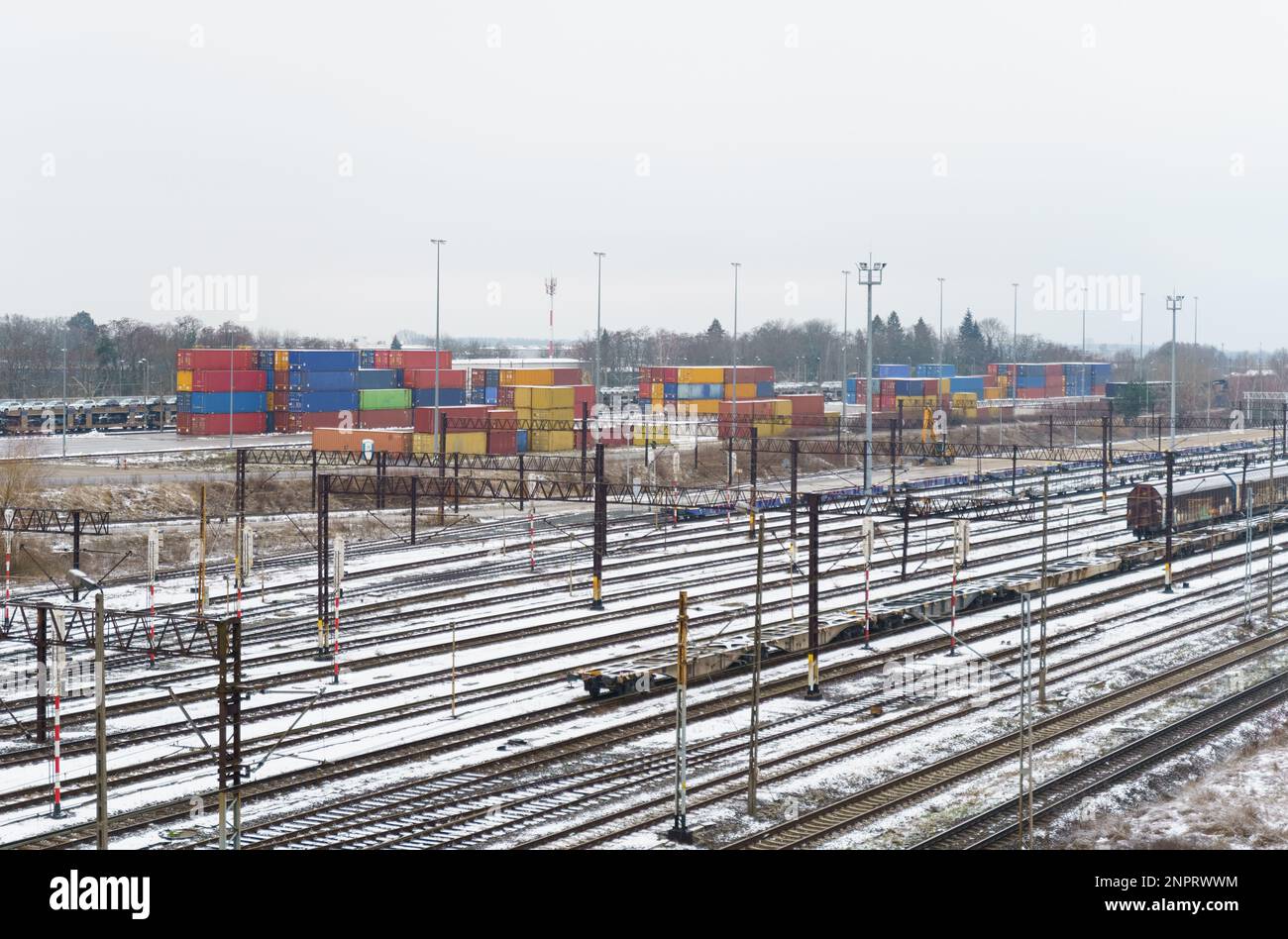 Freight unloading and loading railway station. There are empty wagons ...