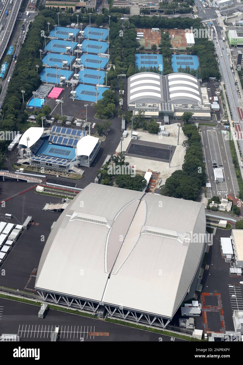 An aerial photo shows Ariake Tennis Park in Tokyo on July 20, 2020 ...