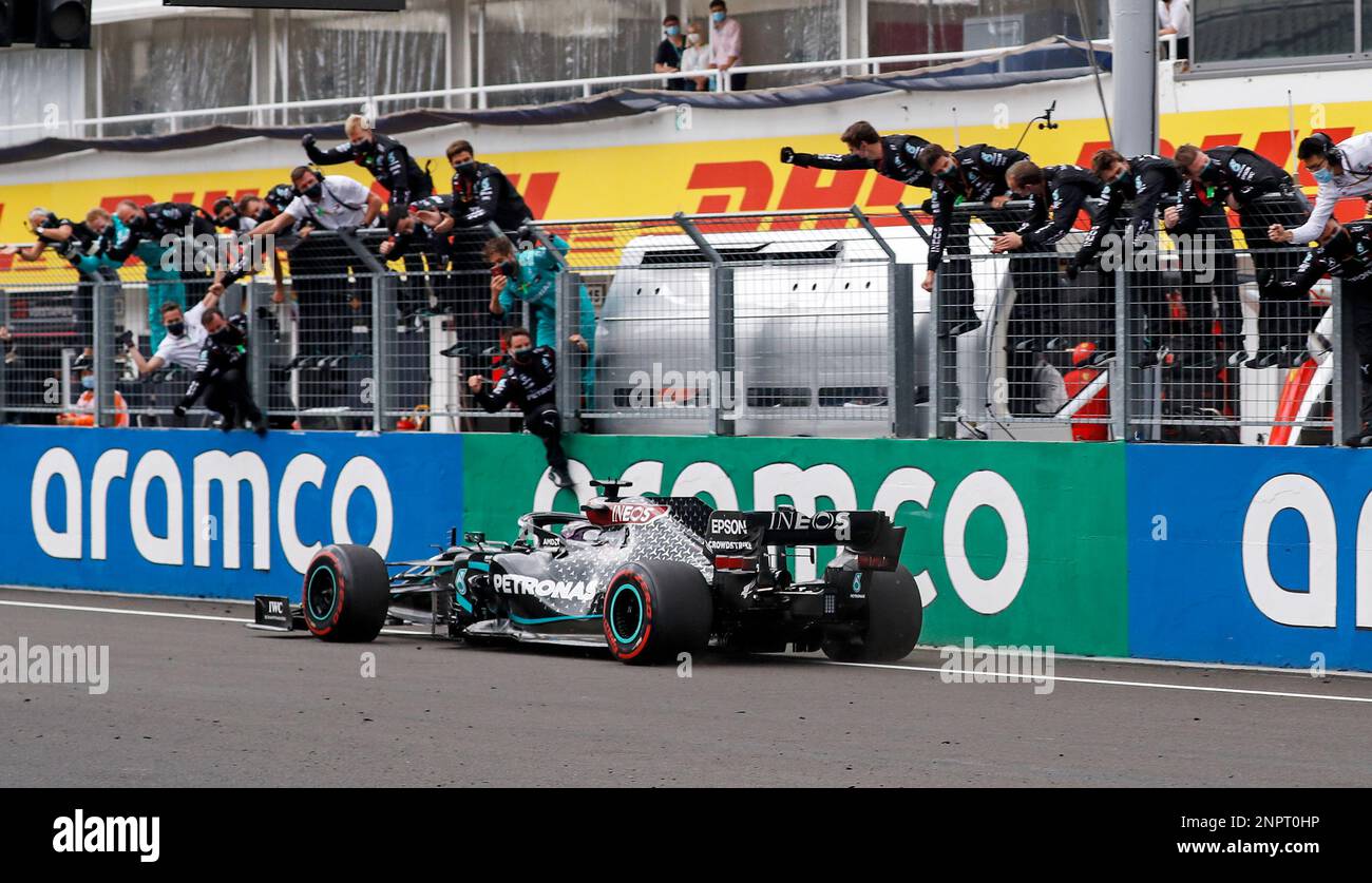 Mercedes driver Lewis Hamilton of Britain crosses the finish line in ...