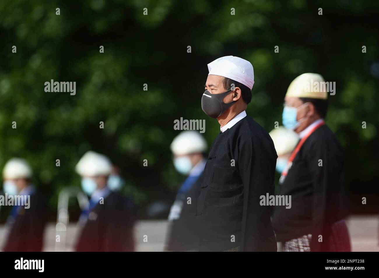 Myanmar President Win Myint wearing face mask salutes at the tomb of ...