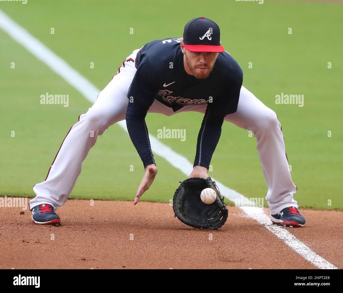Atlanta Braves first baseman Freddie Freeman fields a ground ball by ...