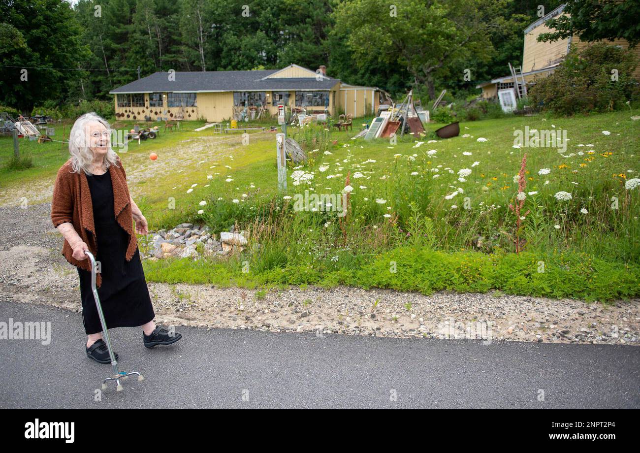 Rena Wilbur, 87, walks from Wilbur's Antiques to her home along the ...