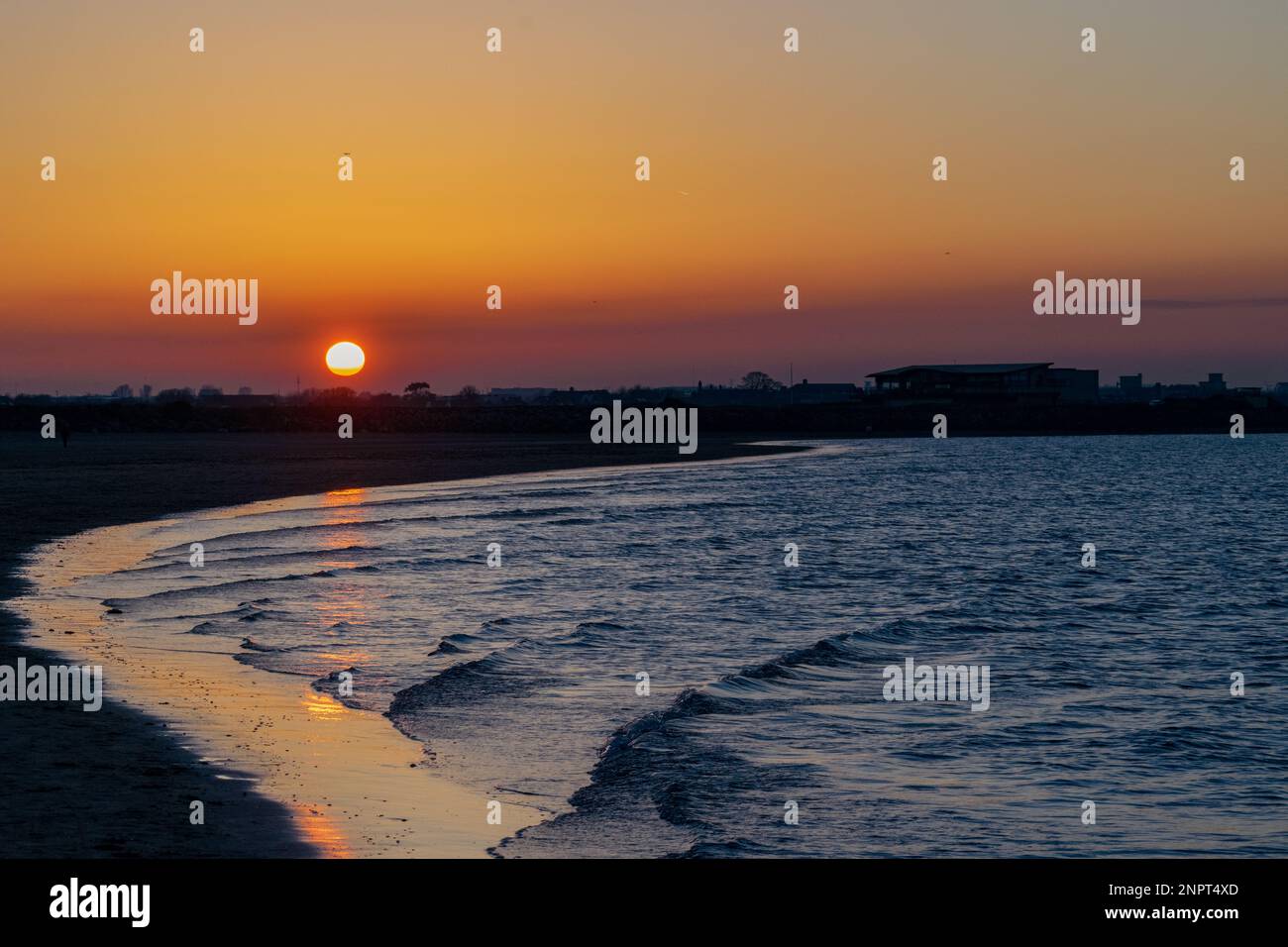 Hazy sunset on Burrow Beach Stock Photo - Alamy