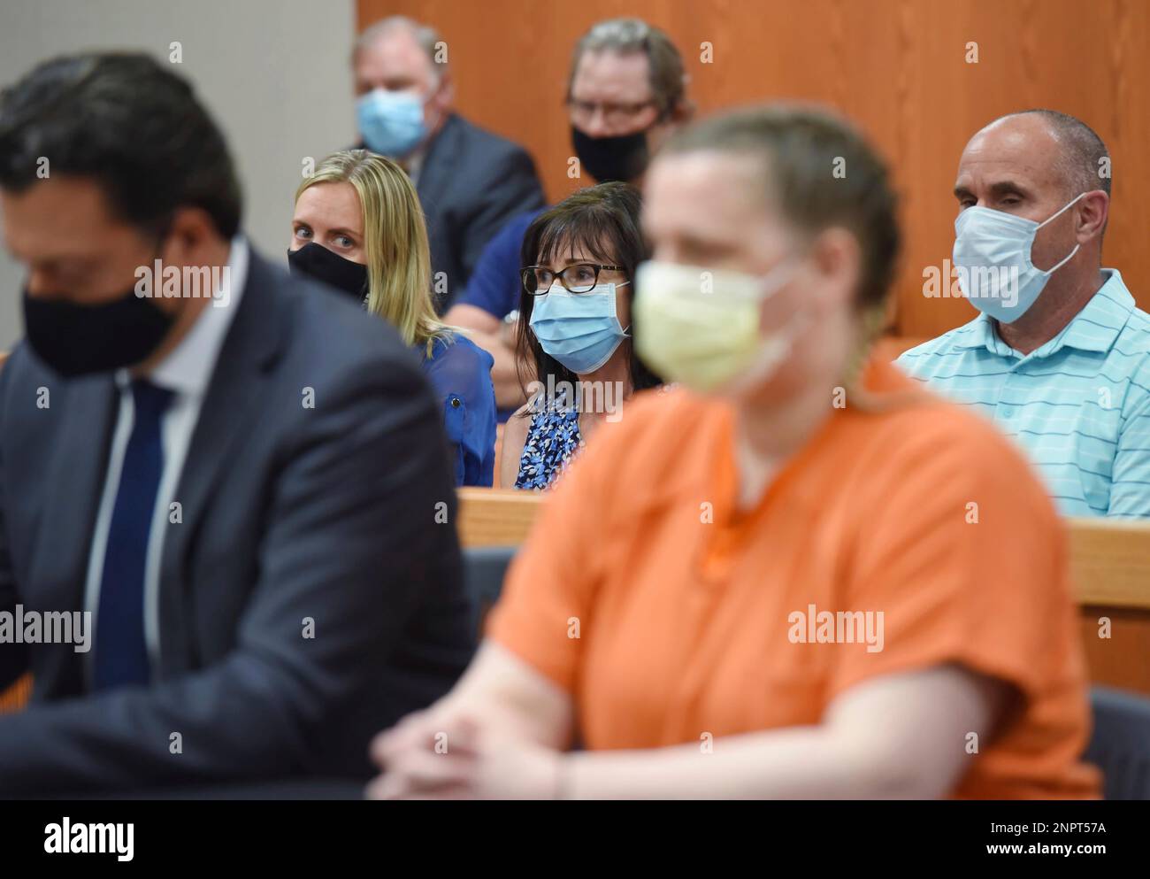 Family of AJ Freund Jr, background, react as JoAnn Cunningham is ...