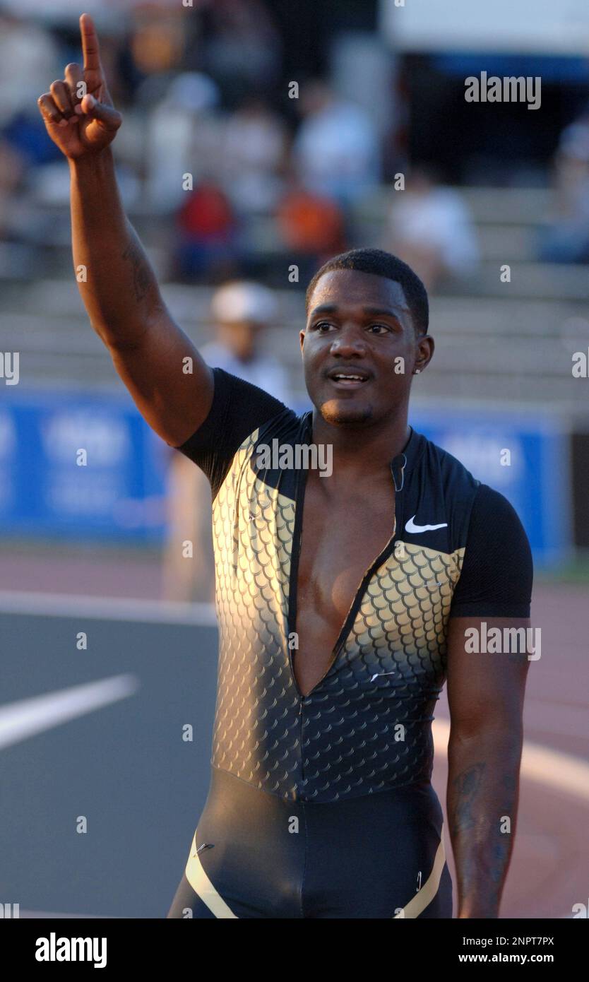 Justin Gatlin celebrates after winning the 100 meters in 9.93 into a 1. ...
