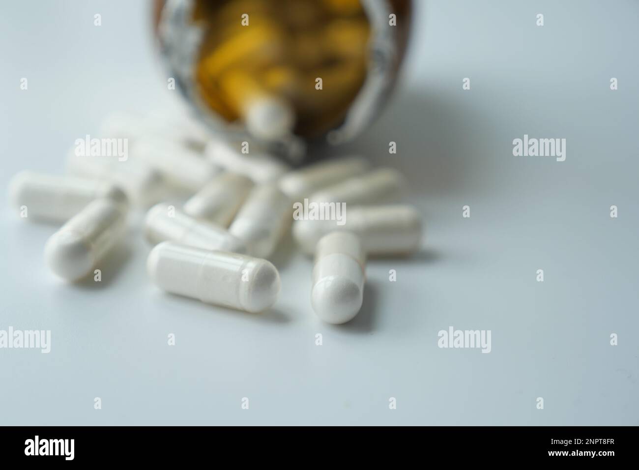 Herbal medicine capsule dropping on hi-res stock photography and images ...