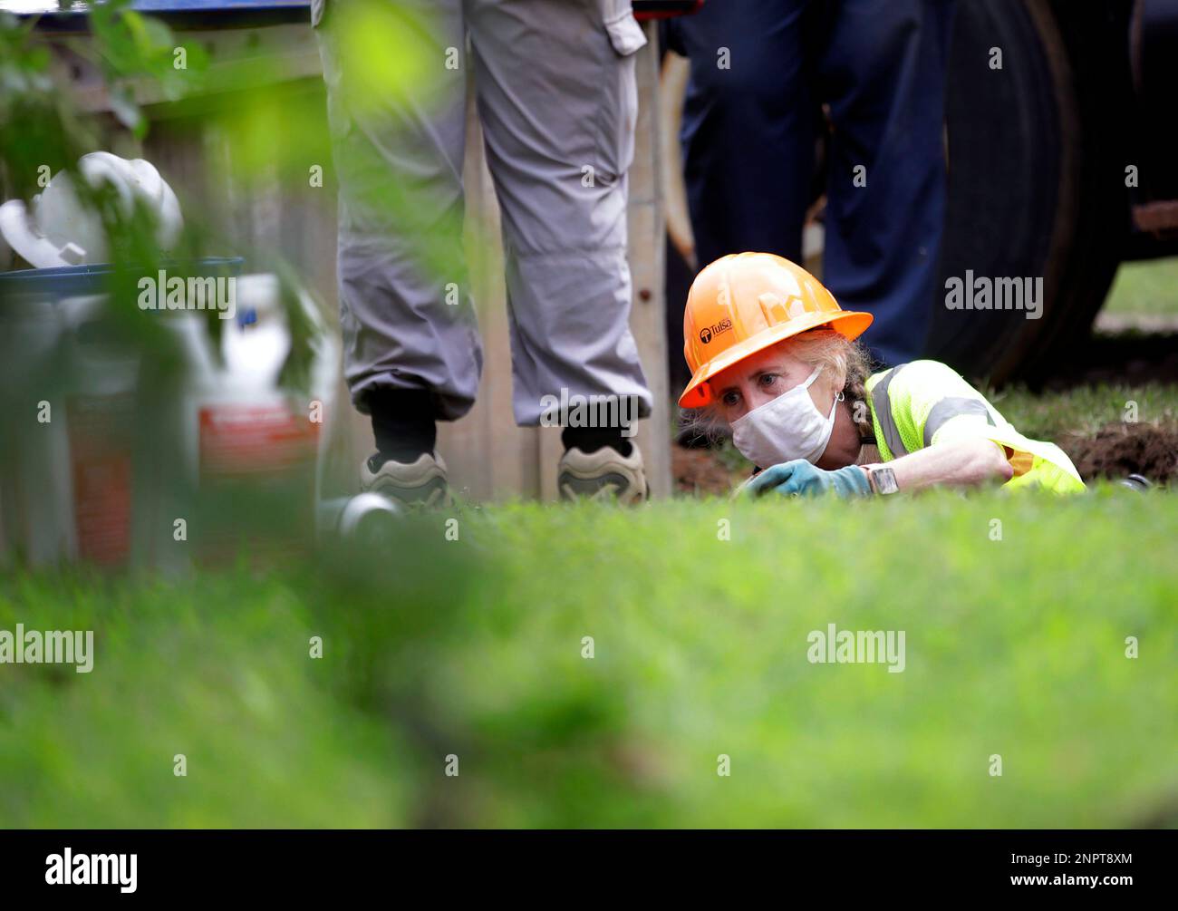 Angela Berg, a forensic anthropologist with the State Medical Examiner ...